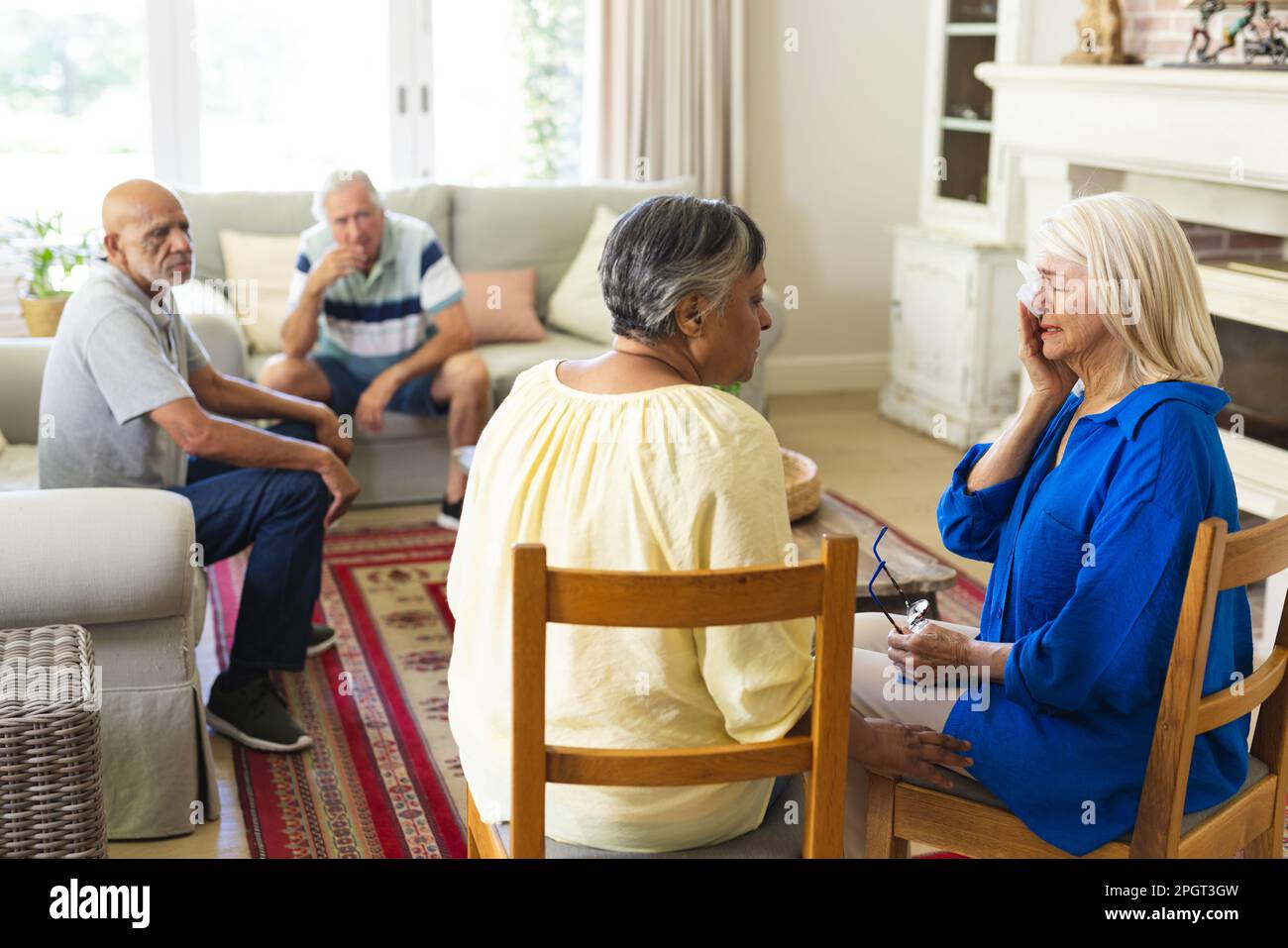 Four people group hi-res stock photography and images - Alamy