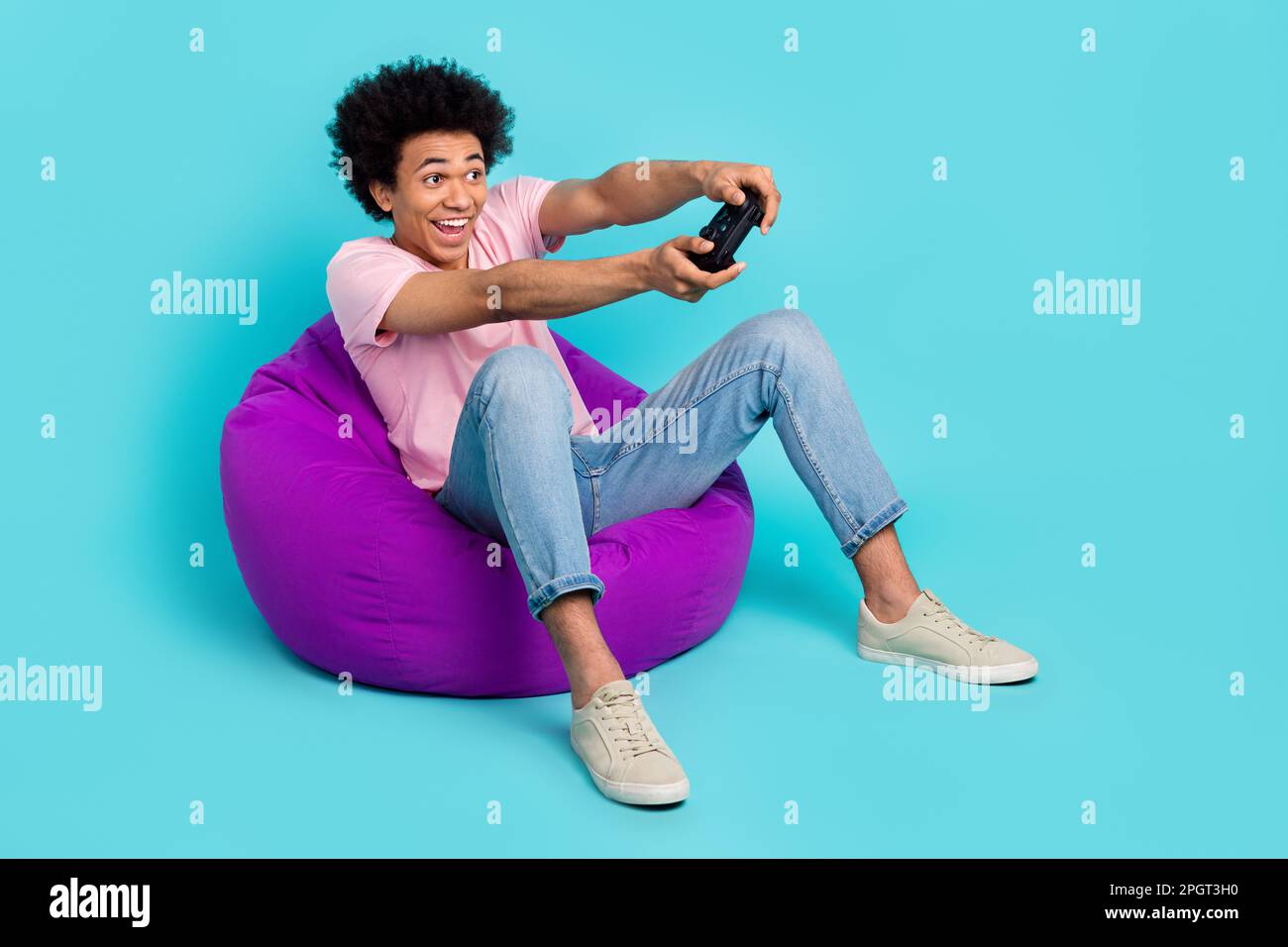 Full body photo of young professional console player funny chevelure ...