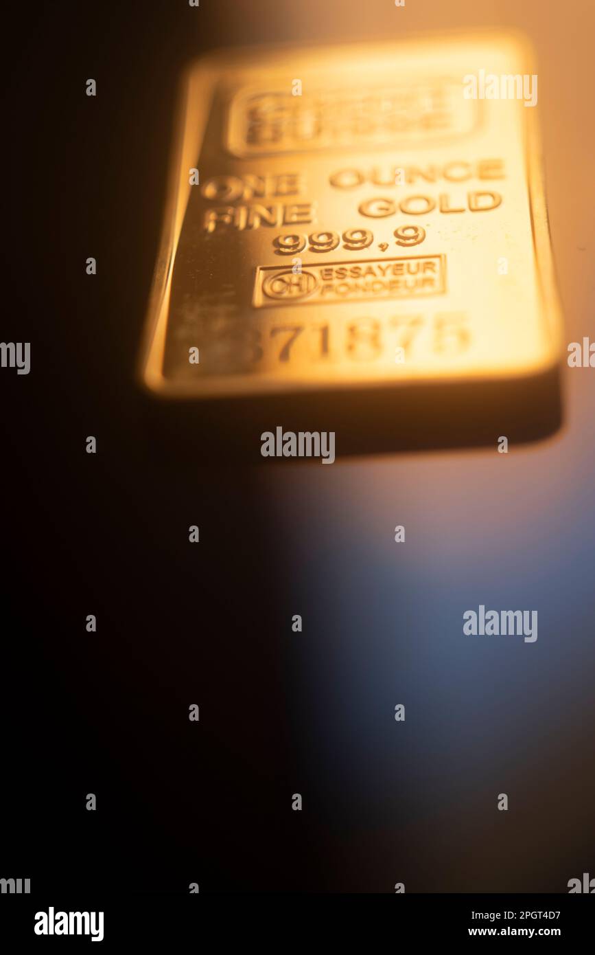 Solid pure 999.9 gold bullion ingot bars photo Stock Photo - Alamy