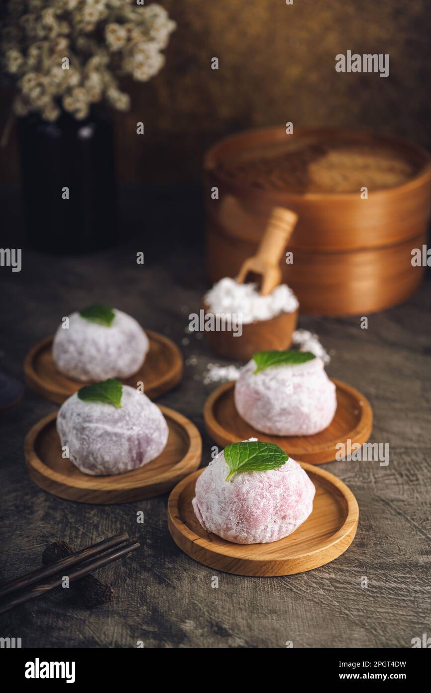 Japanese mochi or rice cake filled with red bean and strawberry, mint ...