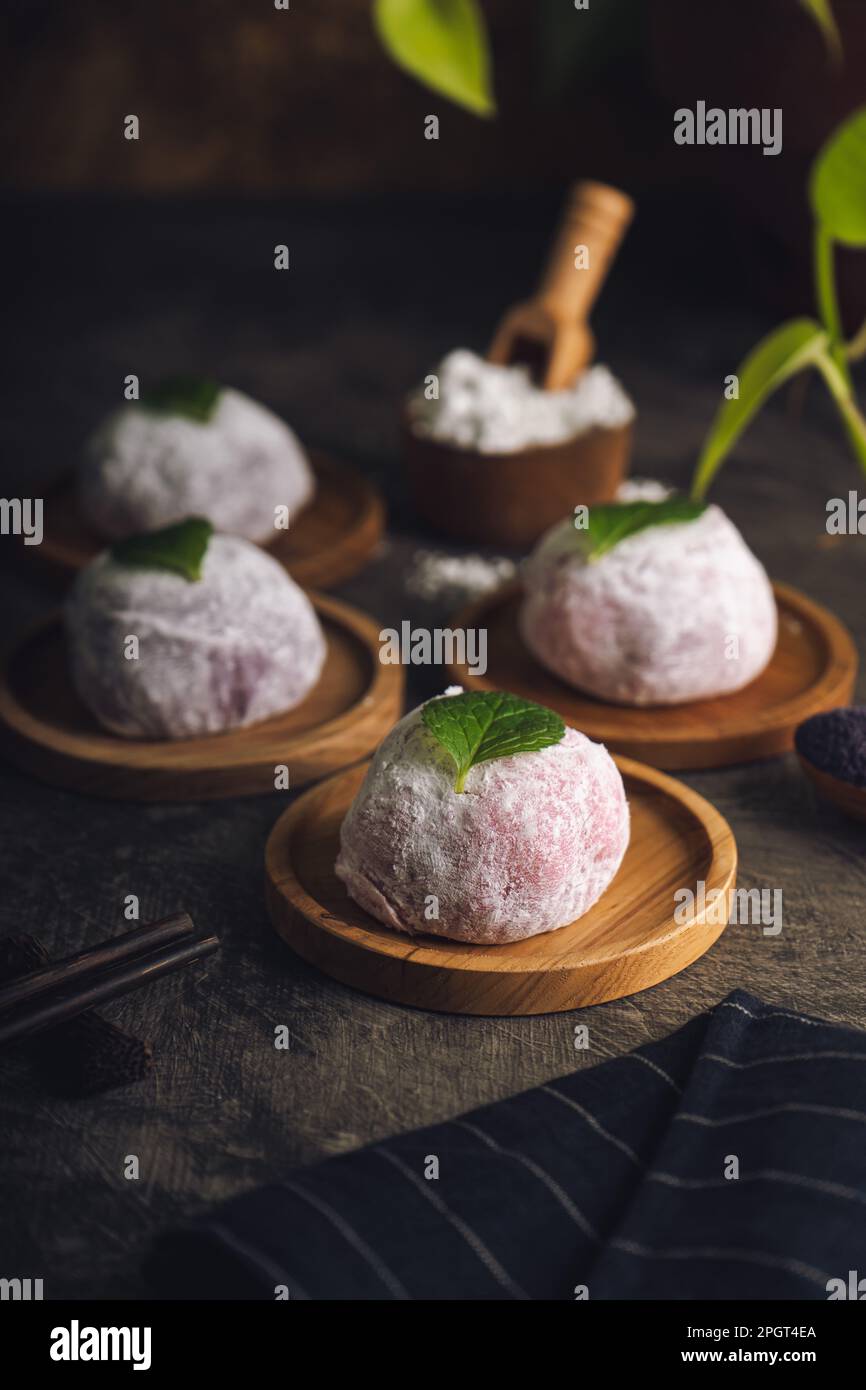 Japanese mochi or rice cake filled with red bean and strawberry, mint ...