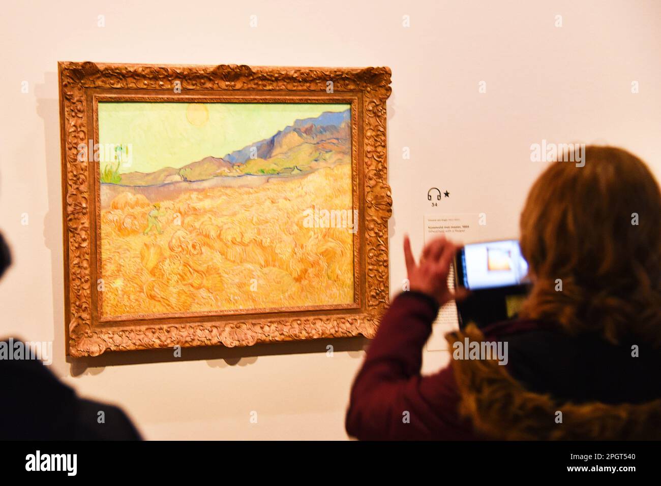 Amsterdam, Netherlands. January 2023. Visitors admire paintings by ...
