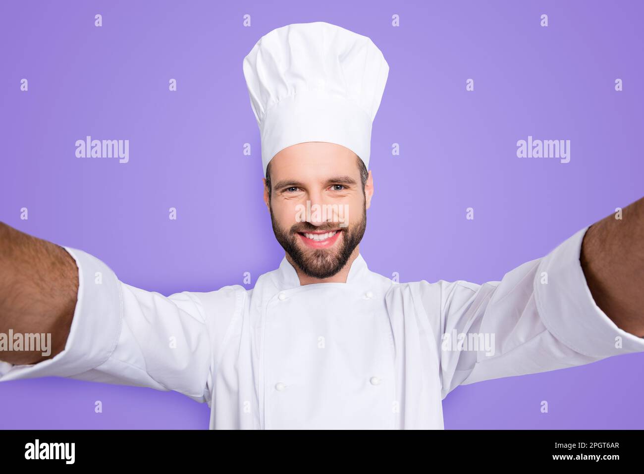 Self portrait of cheerful attractive chef cook in beret and white ...
