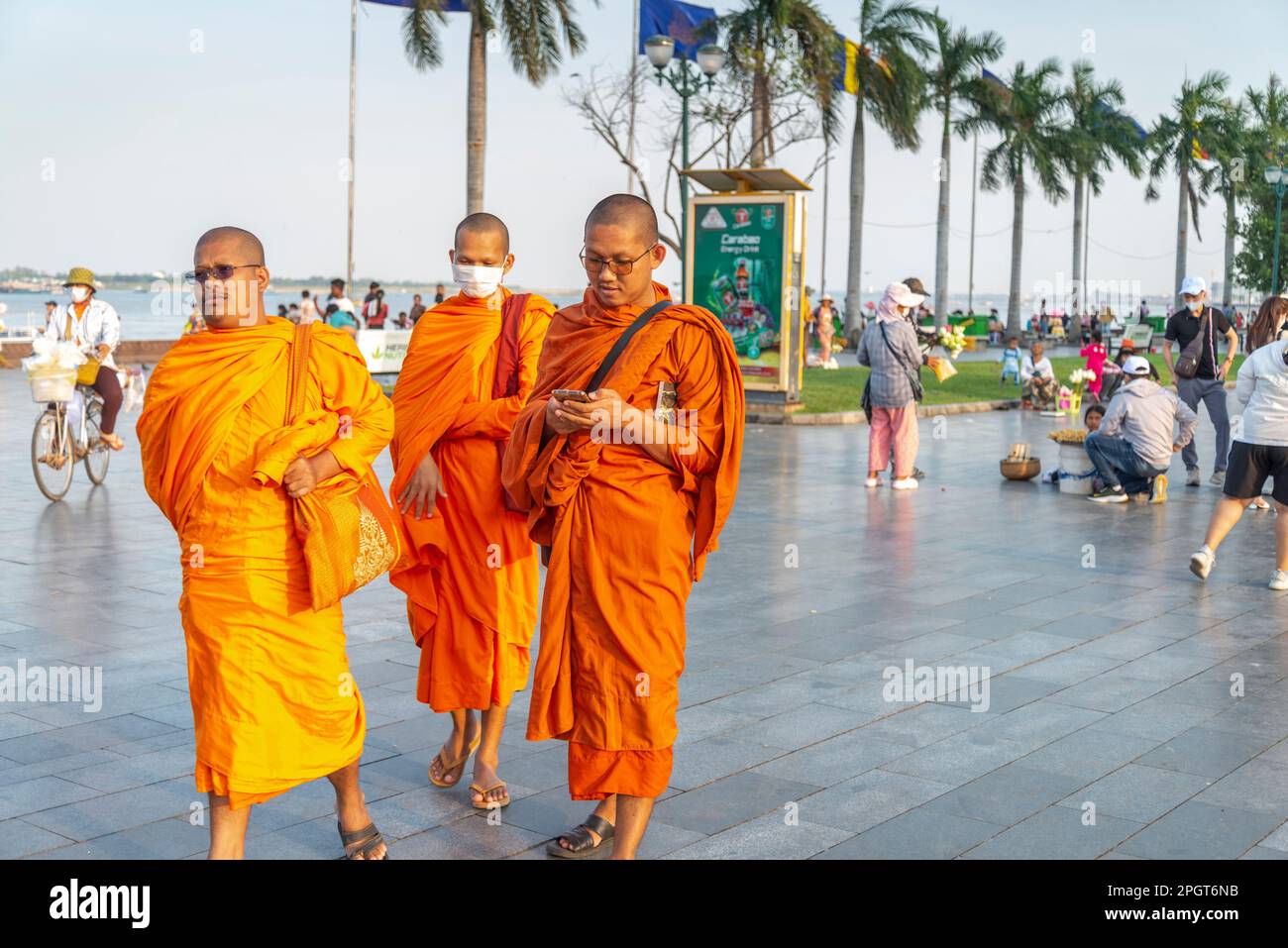 Phnom Penh,Cambodia-December 23rd 2022:Dressed in traditional orange ...