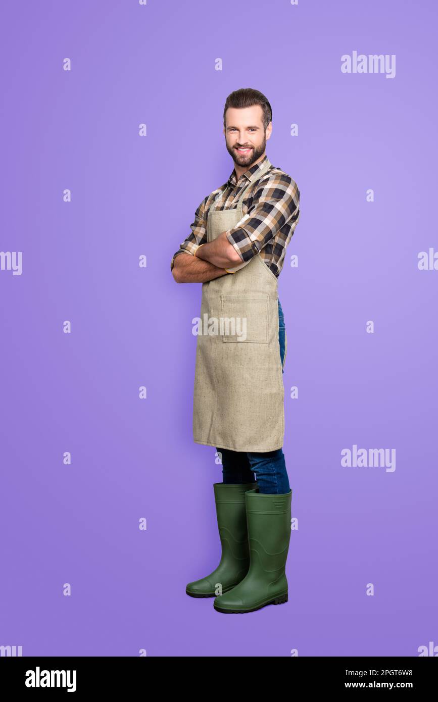 Full size body snap portrait of cheerful positive gardener with stubble ...