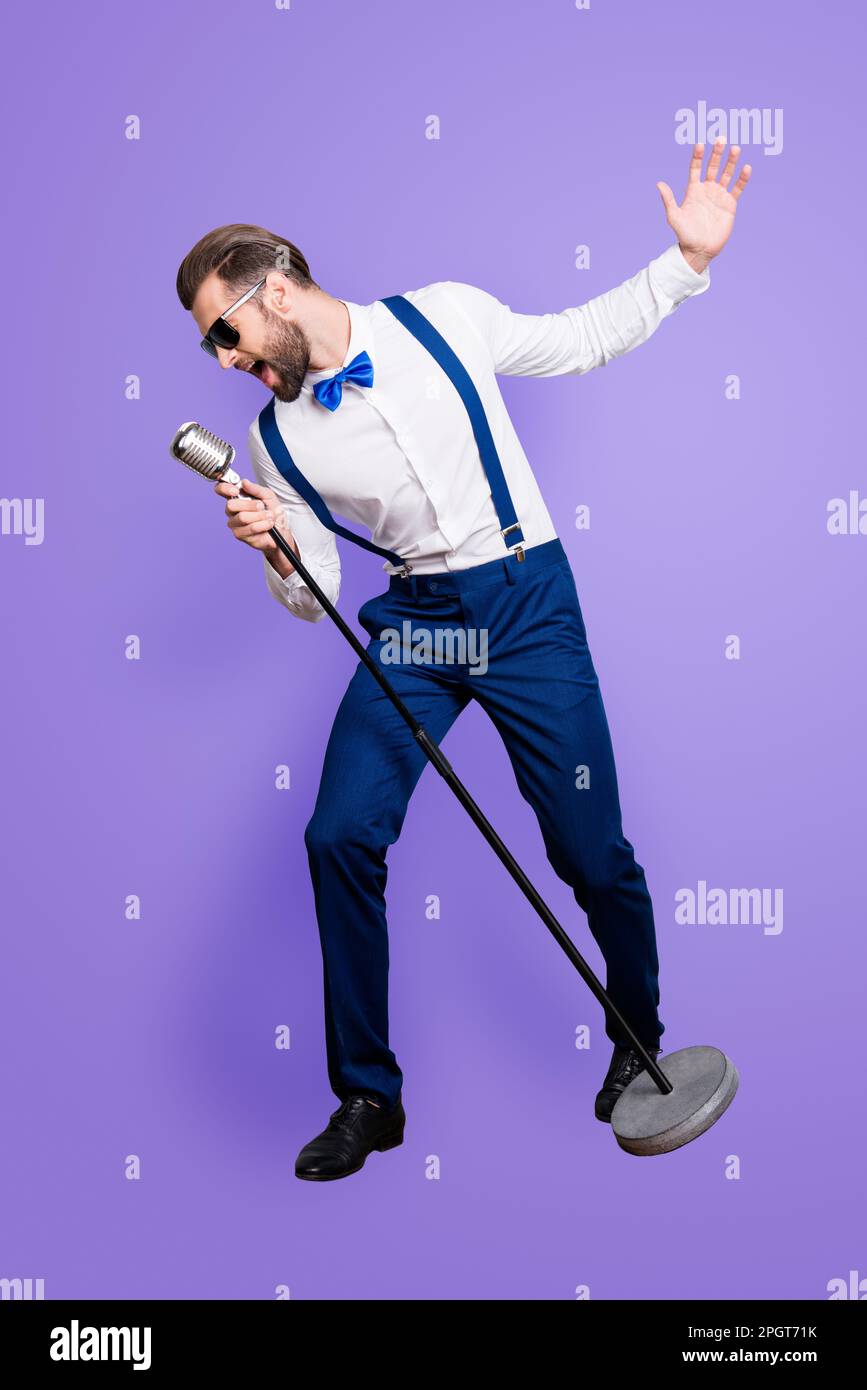 Full size fullbody portrait of famous creative singer in blue pants ...