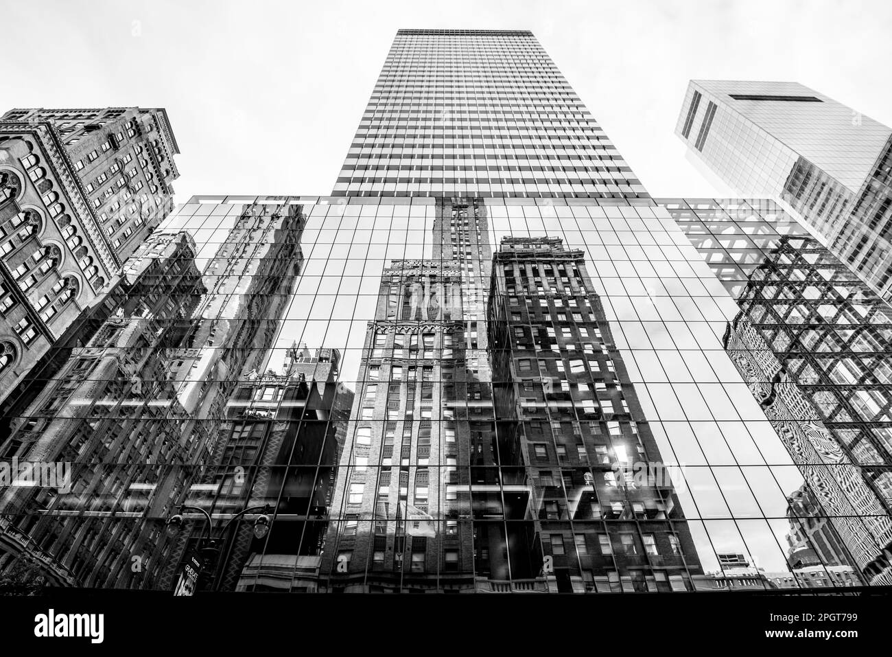 Manhattan street view with big buildings, New York, USA. Black and ...