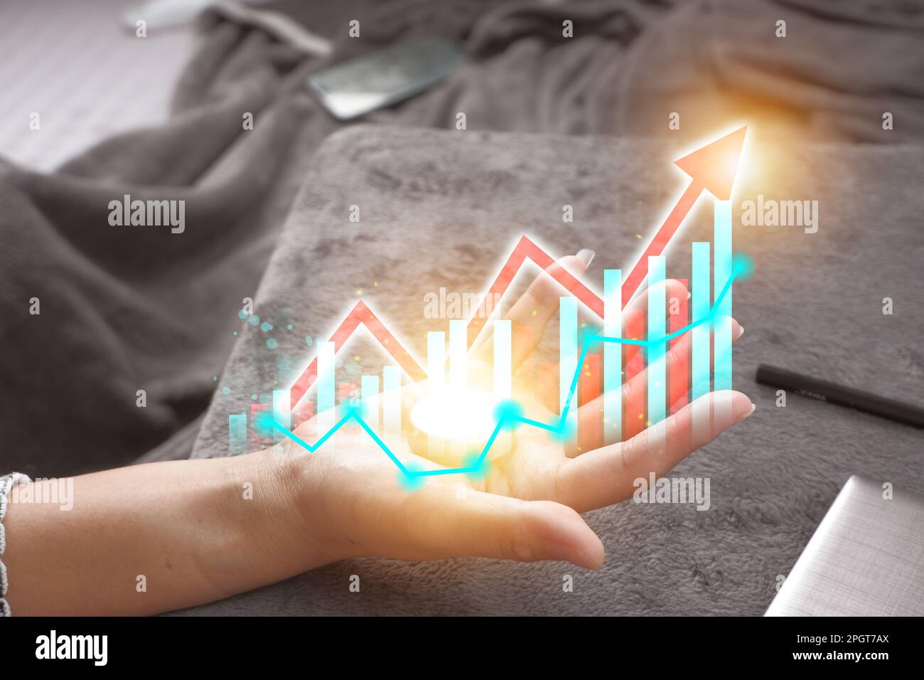 business growth plan with virtual hologram chart Calculate earnings and ...