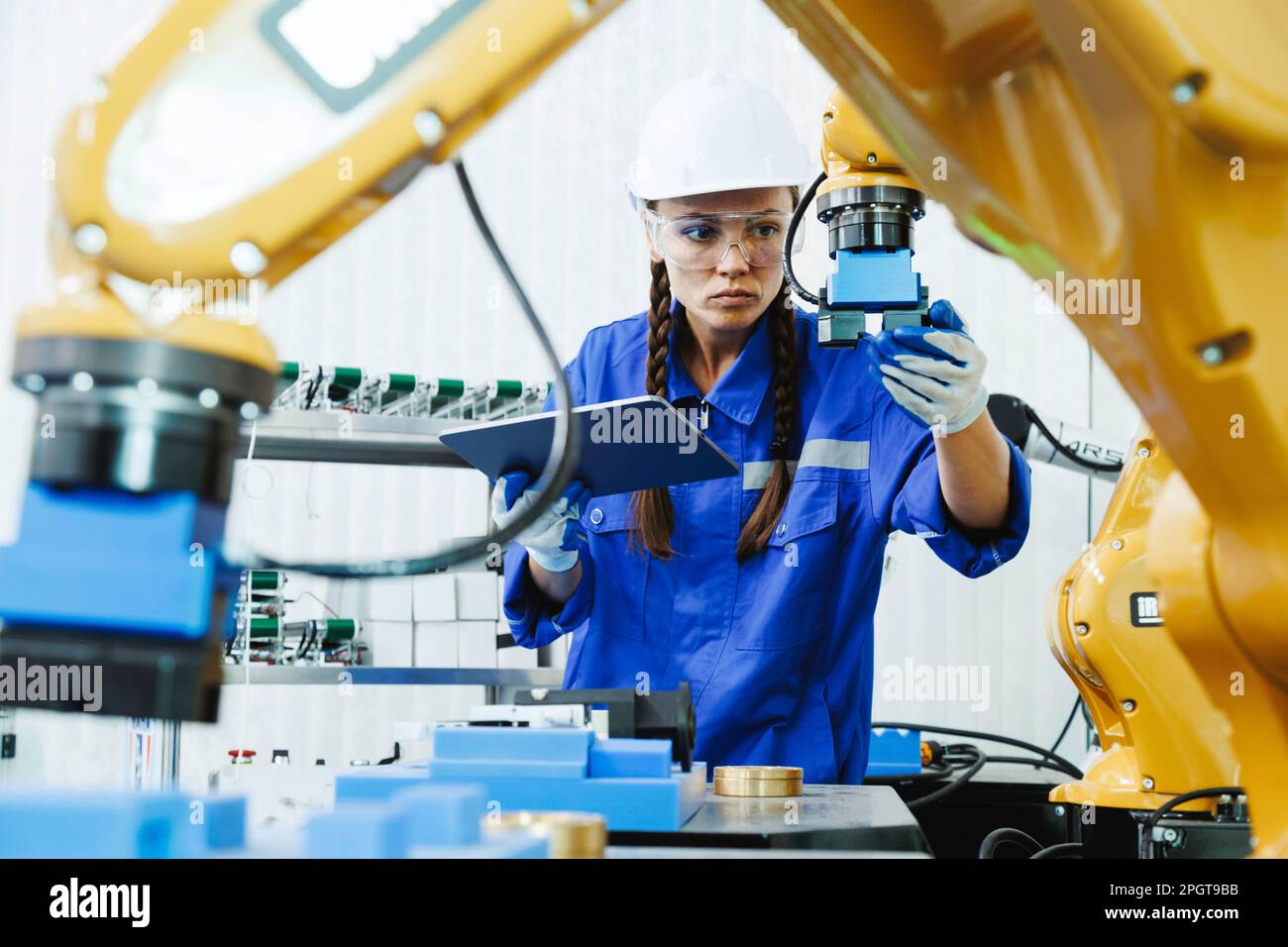 female automation machine engineer student study and inspection control ...