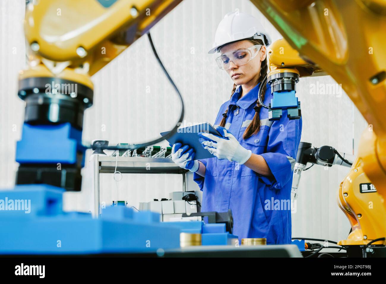 female automation machine engineer student study and inspection control ...