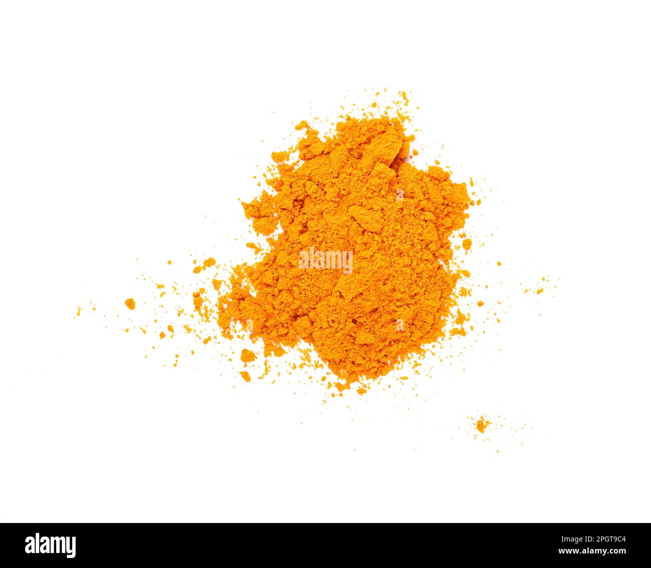 Close up one heap of yellow turmeric spice powder spilled and spread ...