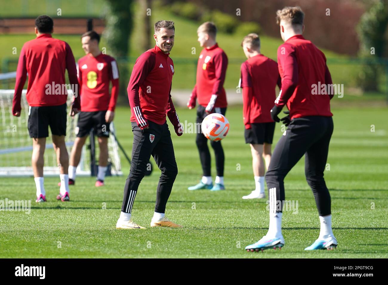 Wales' Aaron Ramsey (centre left) and team-mates during the training ...