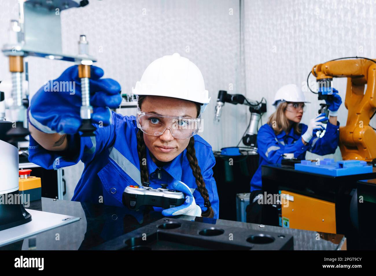 female automation machine engineer student study and inspection control ...