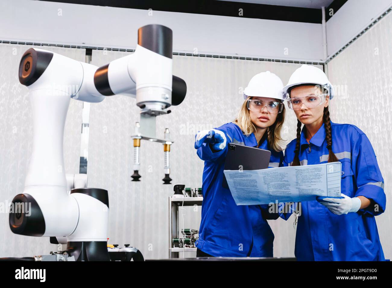 female automation machine engineer student study and inspection control ...