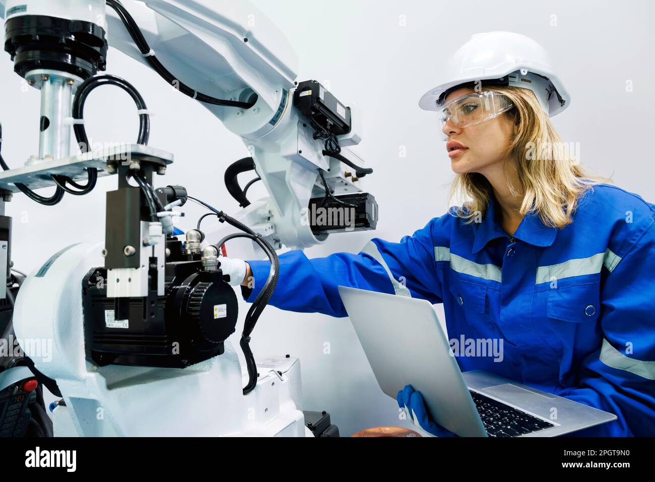 female automation machine engineer student study and inspection control ...