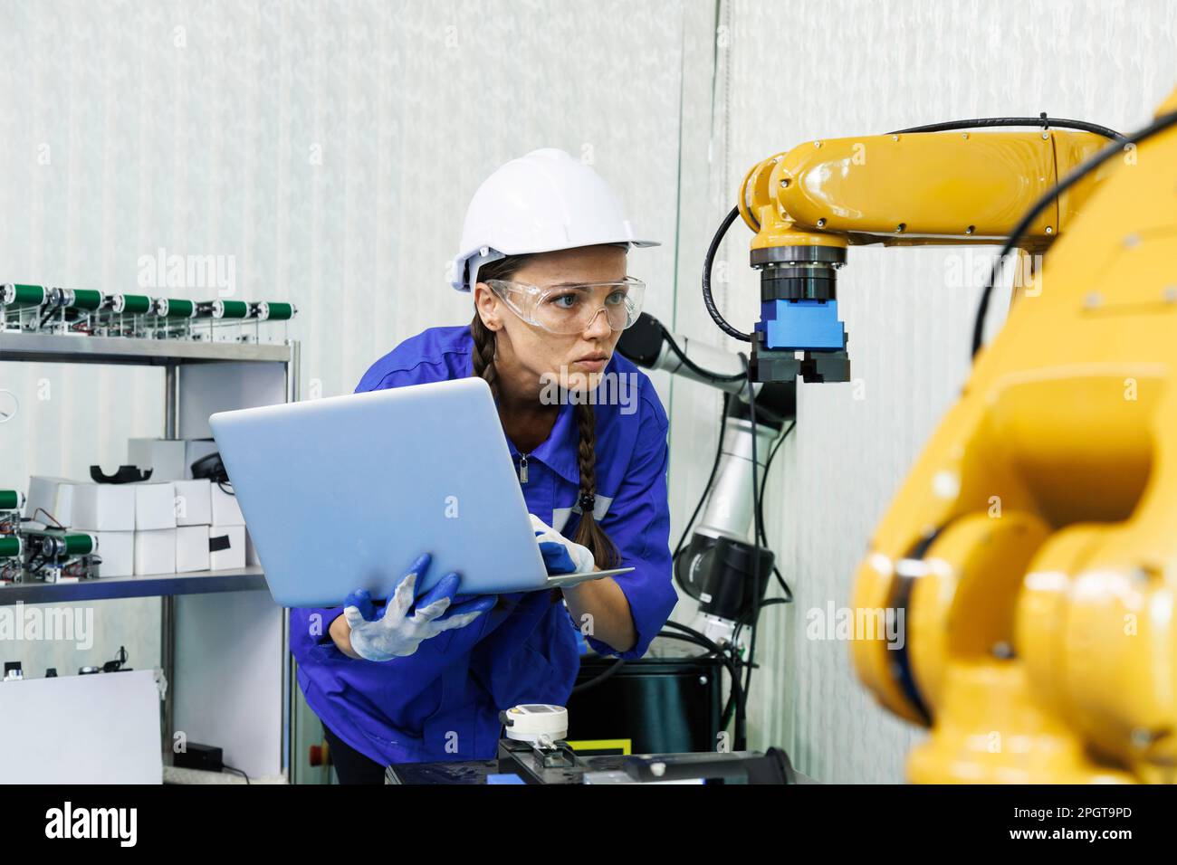 female automation machine engineer student study and inspection control ...