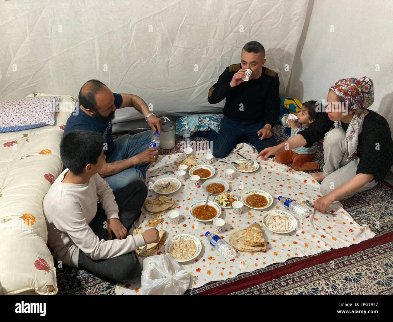 Adiyaman, Turkey. 24th Mar, 2023. The Kaplan family with mother Asli (r ...