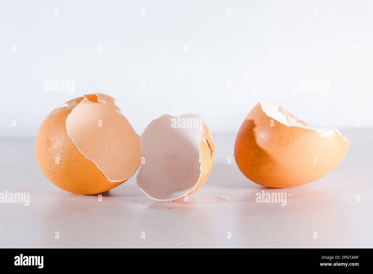 Broken egg isolated on white background, broken egg shell from impact ...