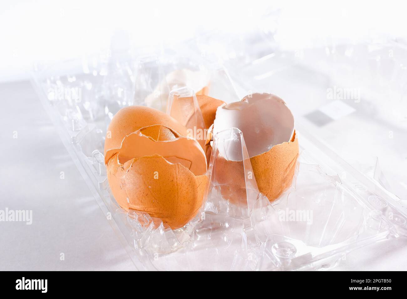 Broken egg isolated on white background, broken egg shell from impact ...