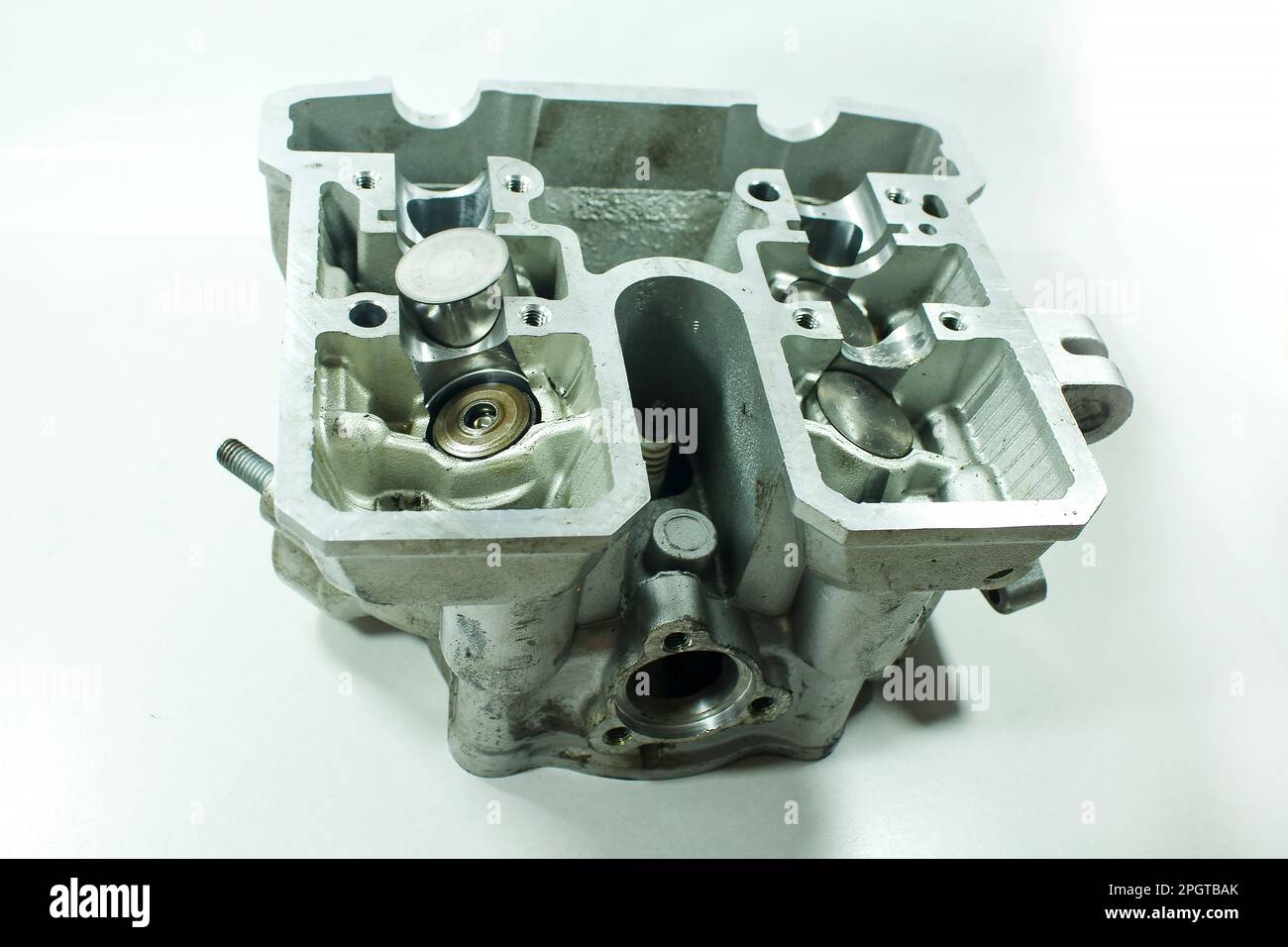 Old motorcycle spare parts on a white background. Motorcycle parts that ...