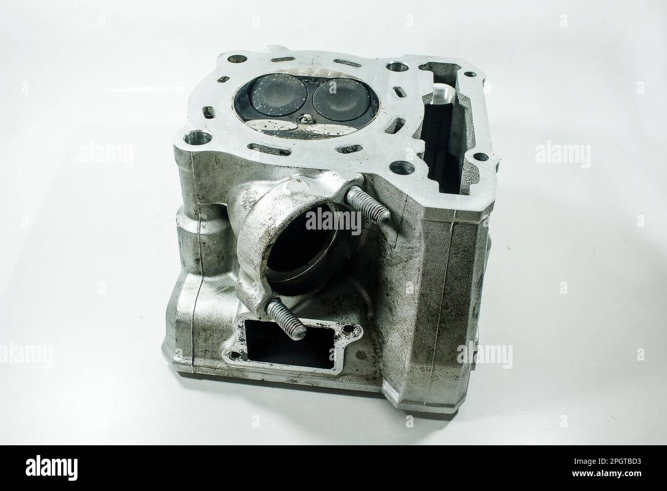 Old motorcycle spare parts on a white background. Motorcycle parts that ...