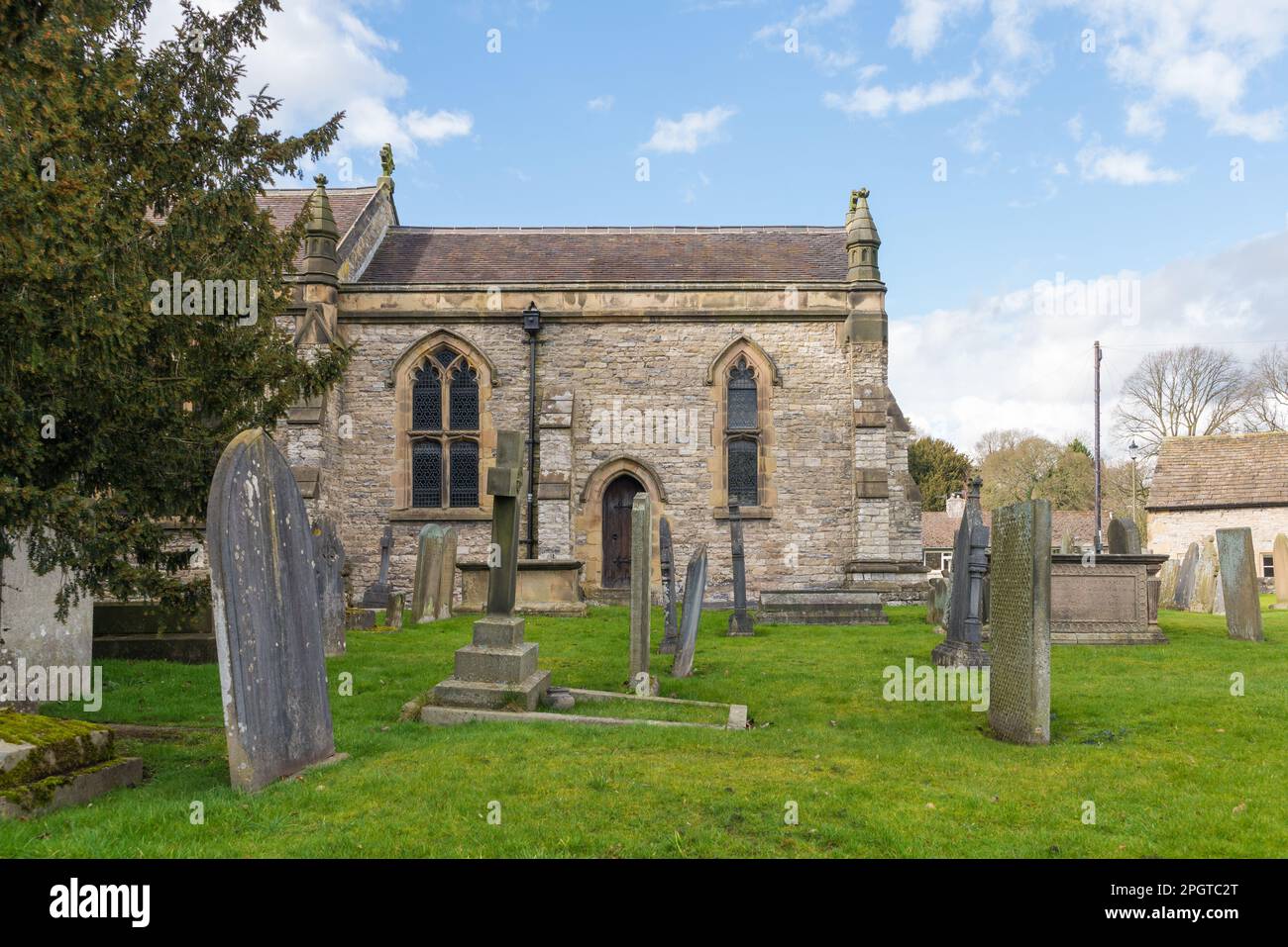 Holy Trinity Church and graveyard in the pretty Derbyshire village of ...