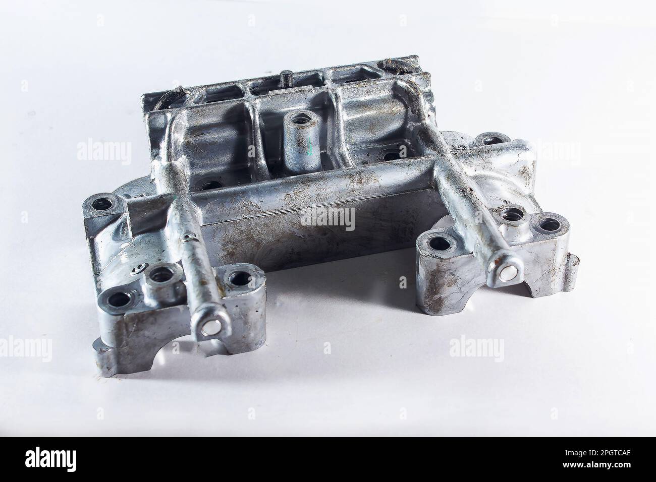 Old motorcycle spare parts on a white background. Motorcycle parts that ...