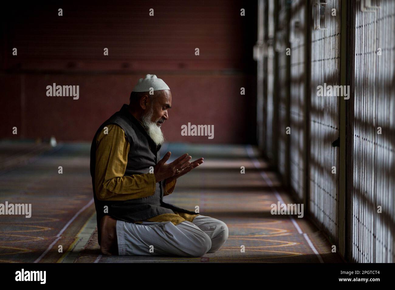 Kathmandu, Nepal. 24th Mar, 2023. A man prays during the Islamic holy ...