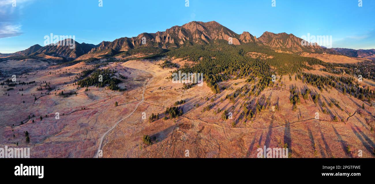 Soft early morning sunlight bathes the landscape and mountains of Bear ...