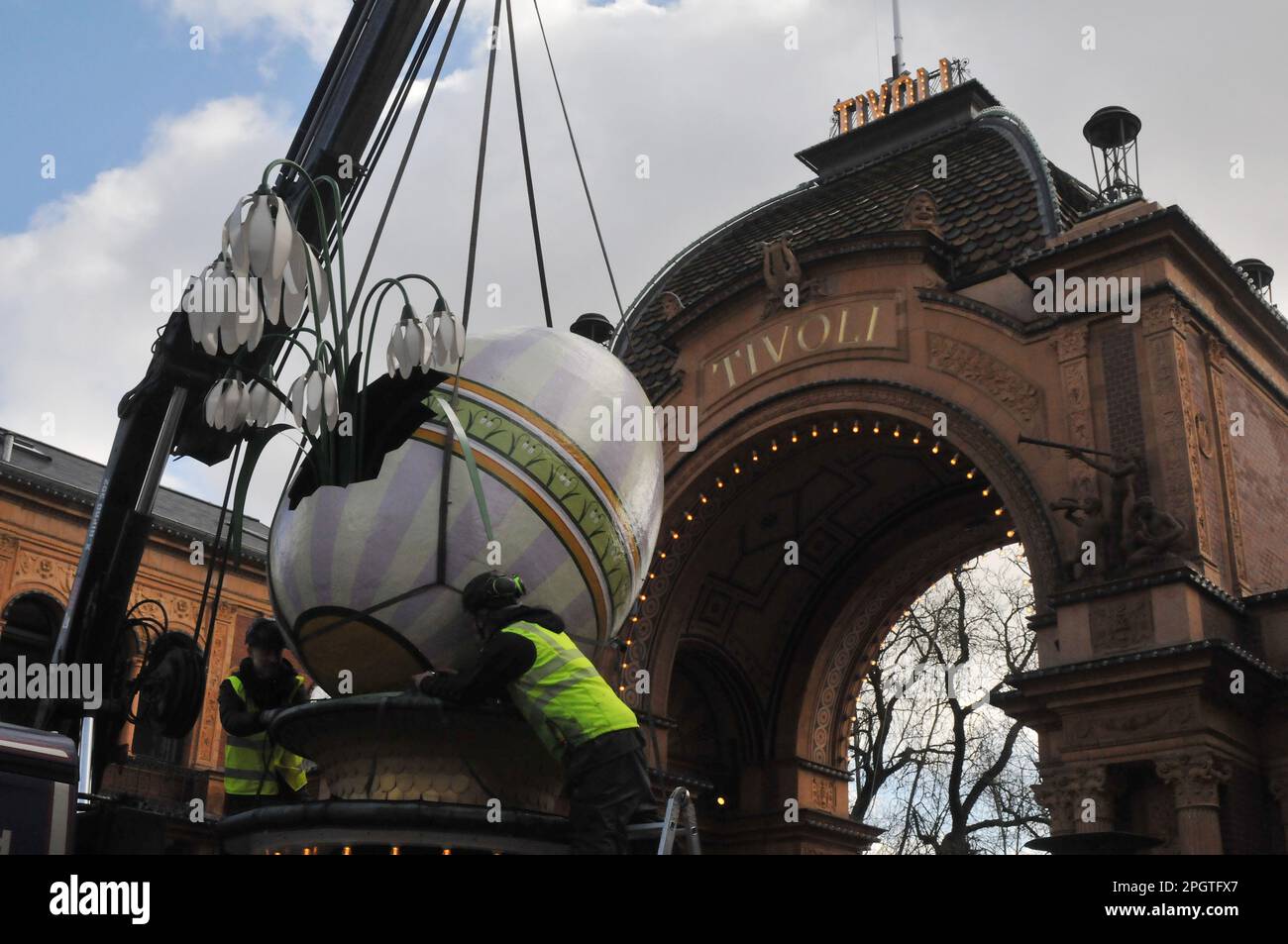 Copenhagen /Denmark/24 March 2023/Male placing huge Easter eggs at main ...