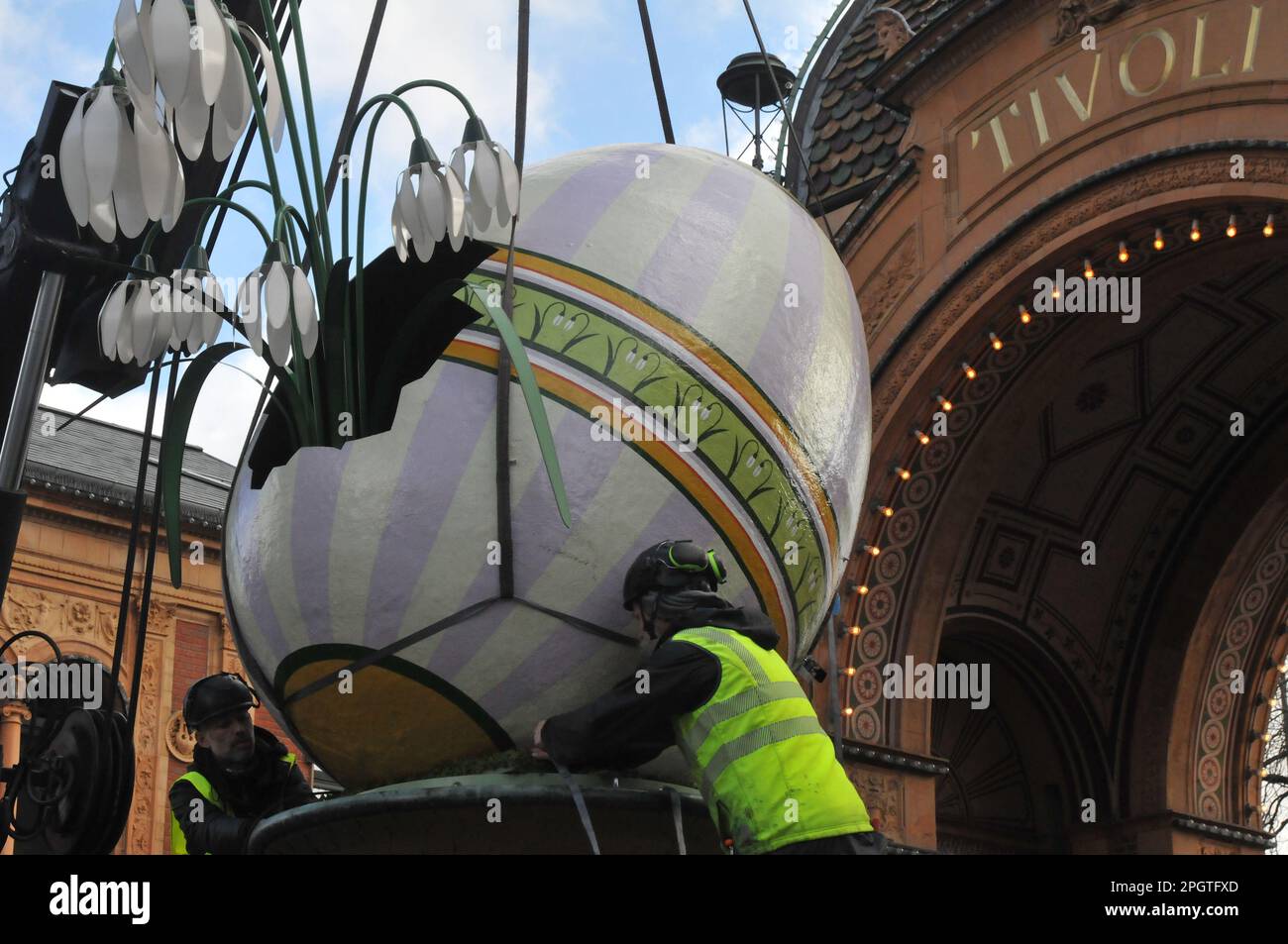 Copenhagen /Denmark/24 March 2023/Male placing huge Easter eggs at main ...