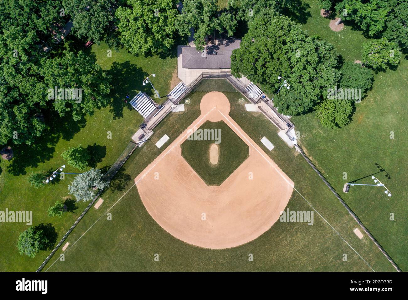 Aerial view of a basebal field in a public park near a suburban ...
