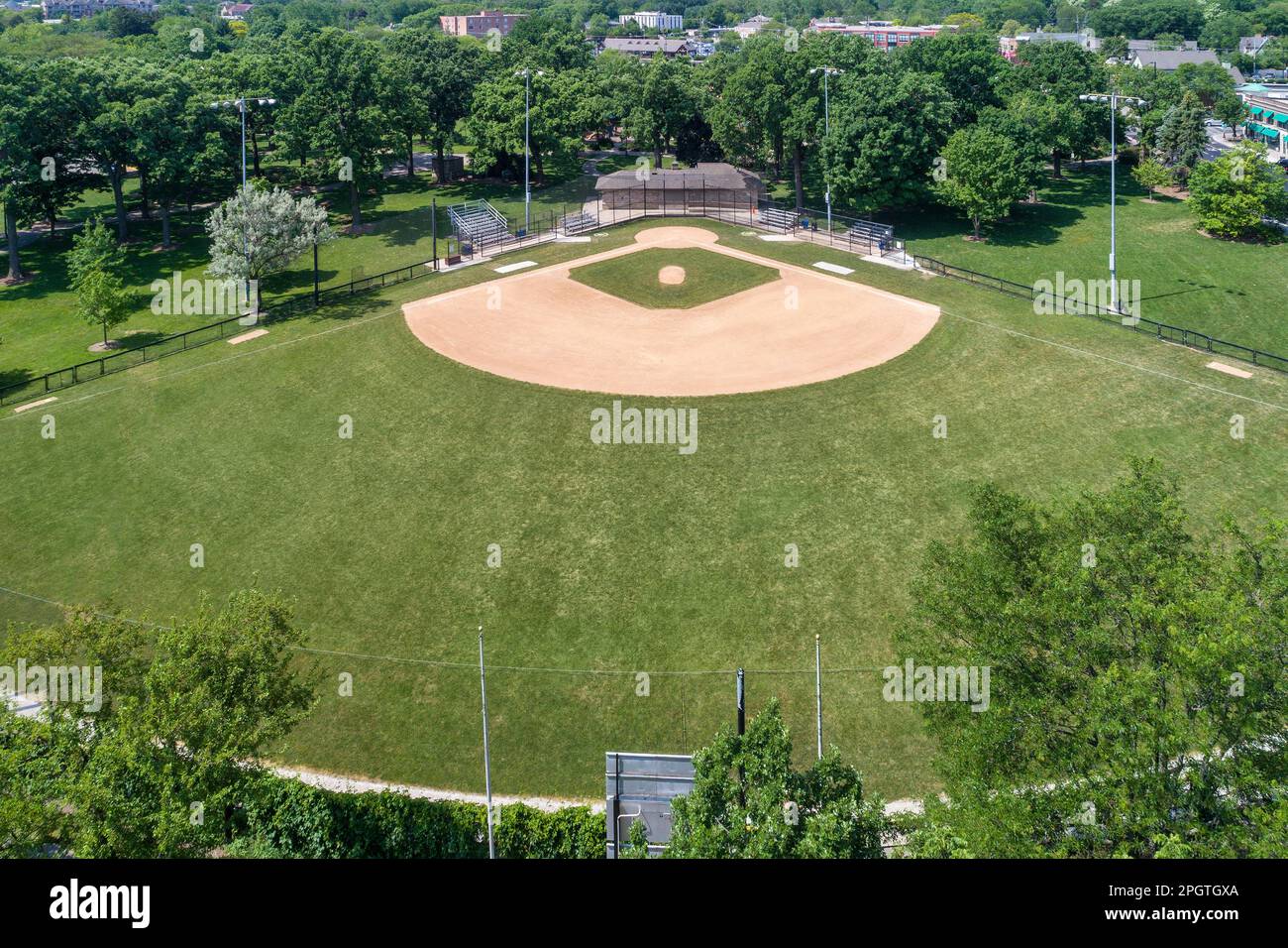 Aerial view of a basebal field in a public park near a suburban ...