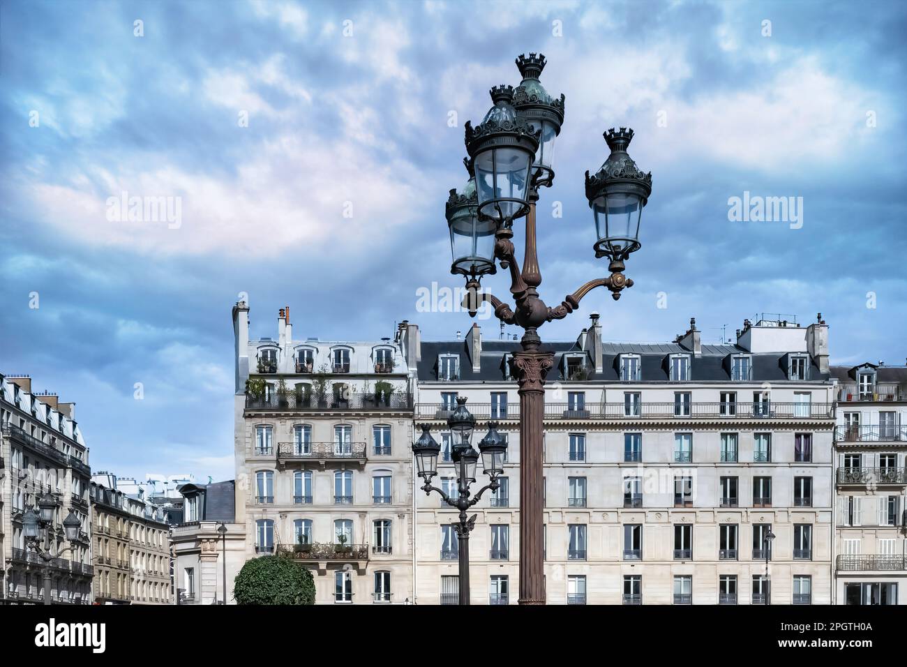 Paris, ancient buildings, typical parisian facades with a lamppost ...