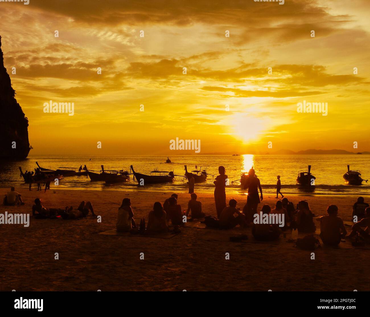 Watching sunset on West Railay beach,Krabi, Thailand, Asia Stock Photo ...