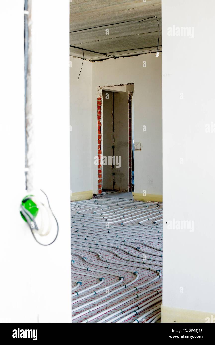 New wiring in plastic box and electrical cables for future wall sockets ...