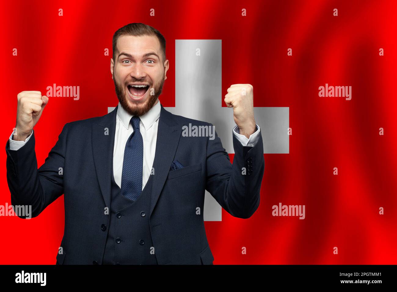Swiss happy businessman on the background of flag of Switzerland ...