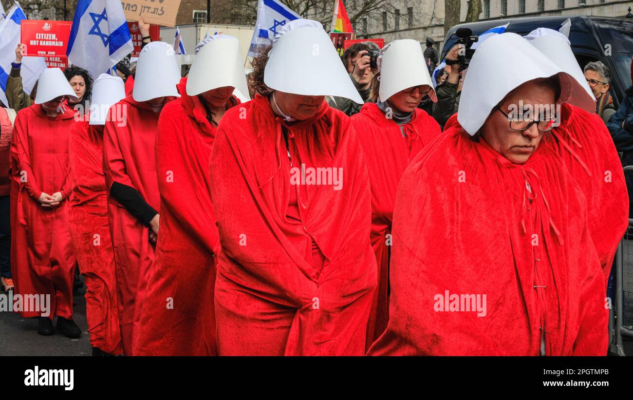 London, UK. 24th Mar, 2023. The handmaidens stop by the Women of WWII ...