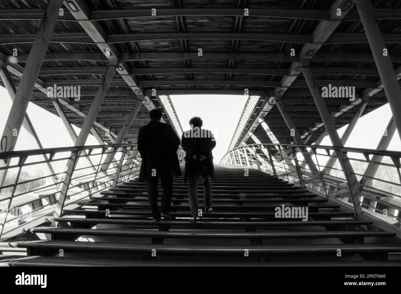 Back view of two men on the way to hi-res stock photography and images ...