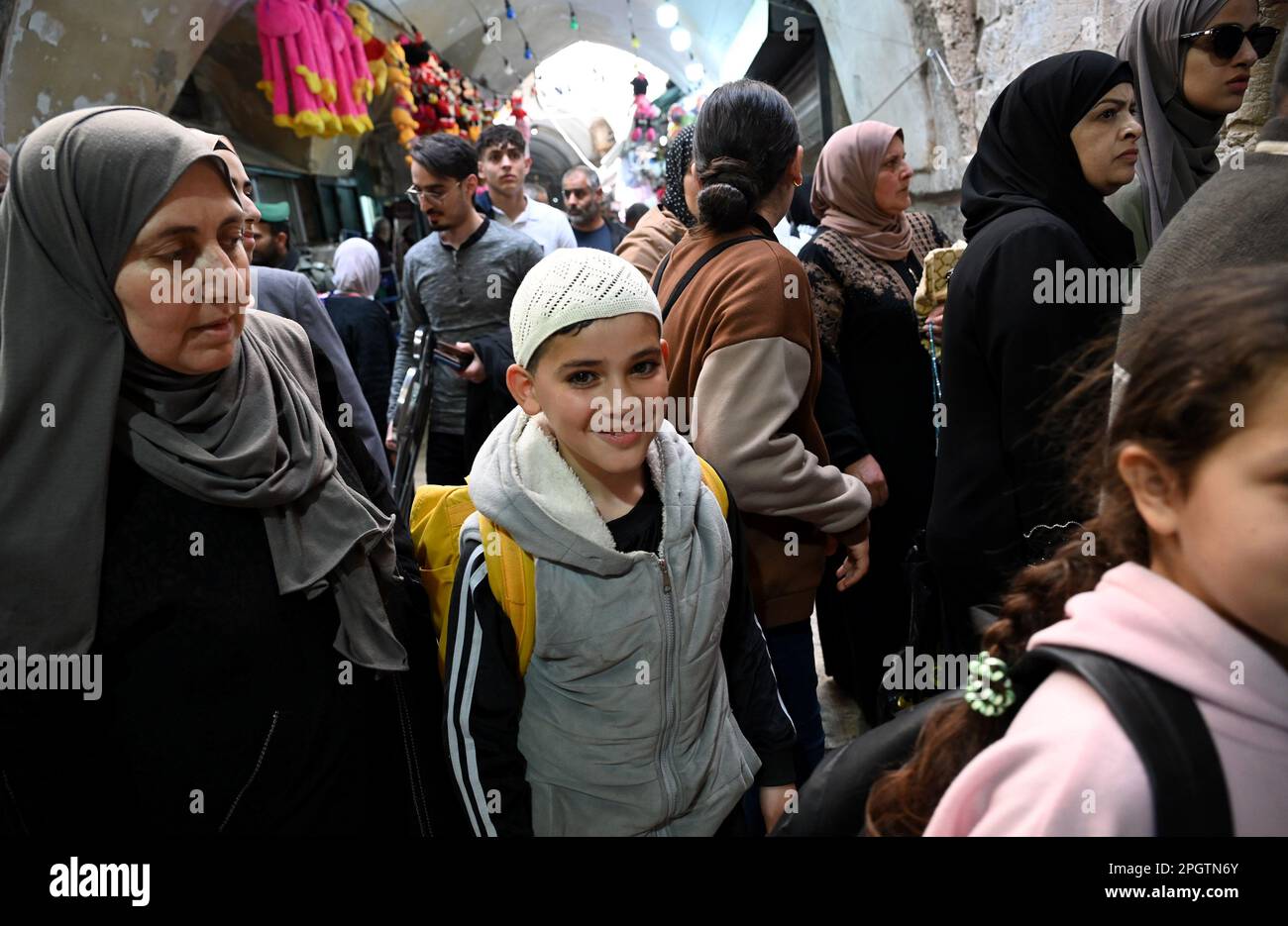 Old City Jerusalem, Israel. 24th Mar, 2023. Palestinians make their way ...
