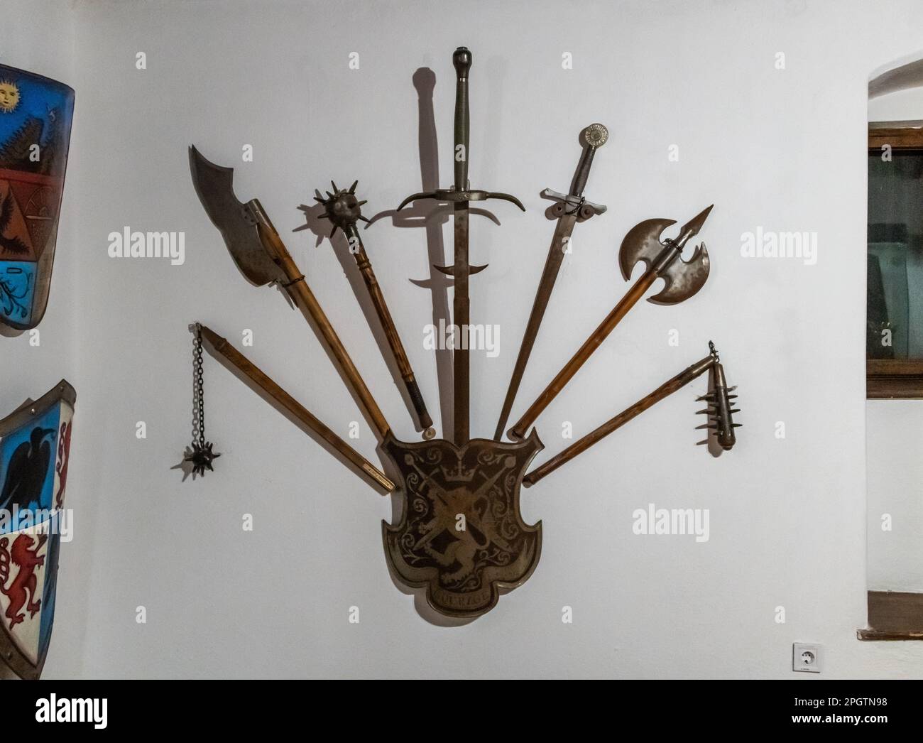 Weapons on the wall of Bran Castle in Transylvania, Romania. The ...