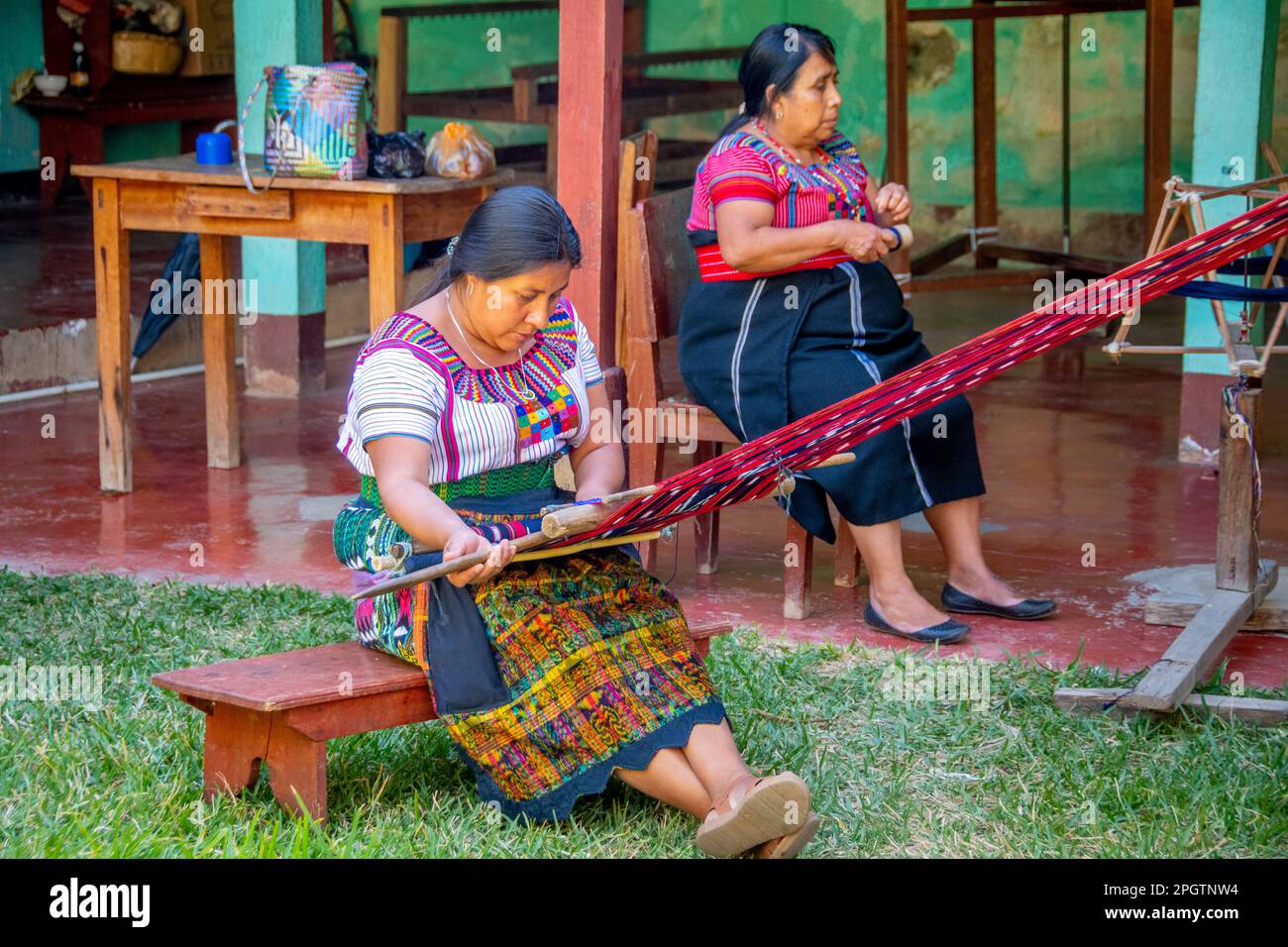 Women making handmade textiles in Guatemala Stock Photo - Alamy