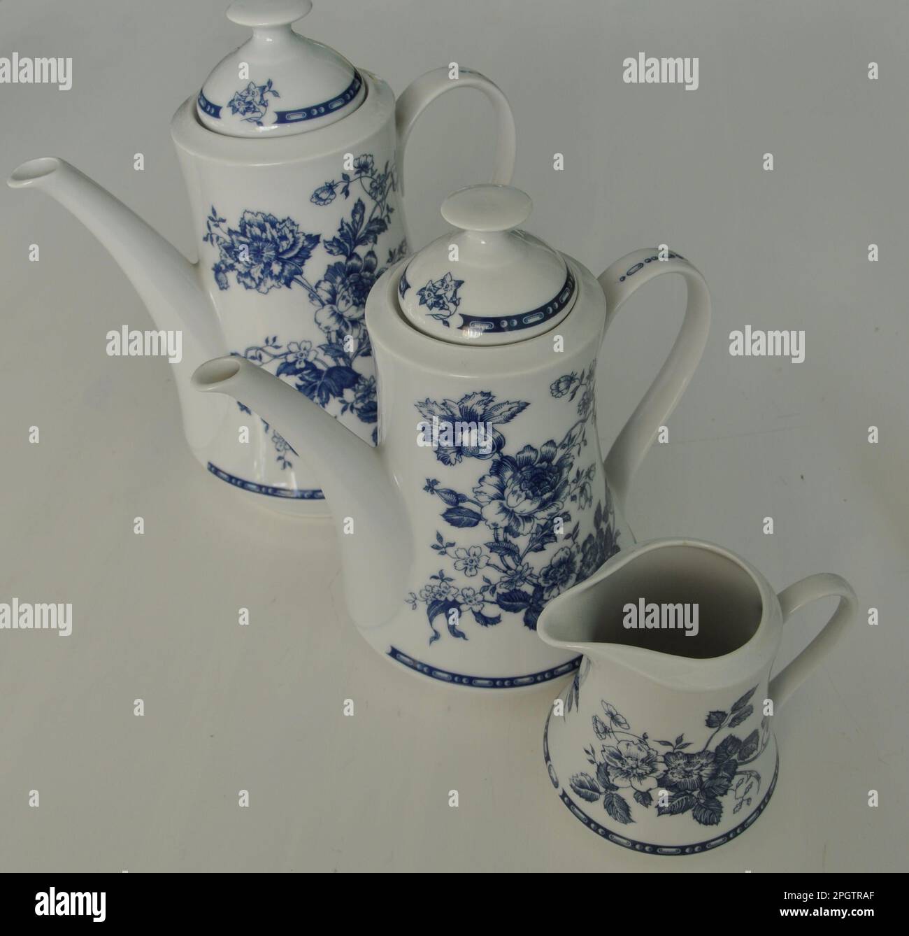 Complete set of milk and sugar service on a white background. Beautiful ...