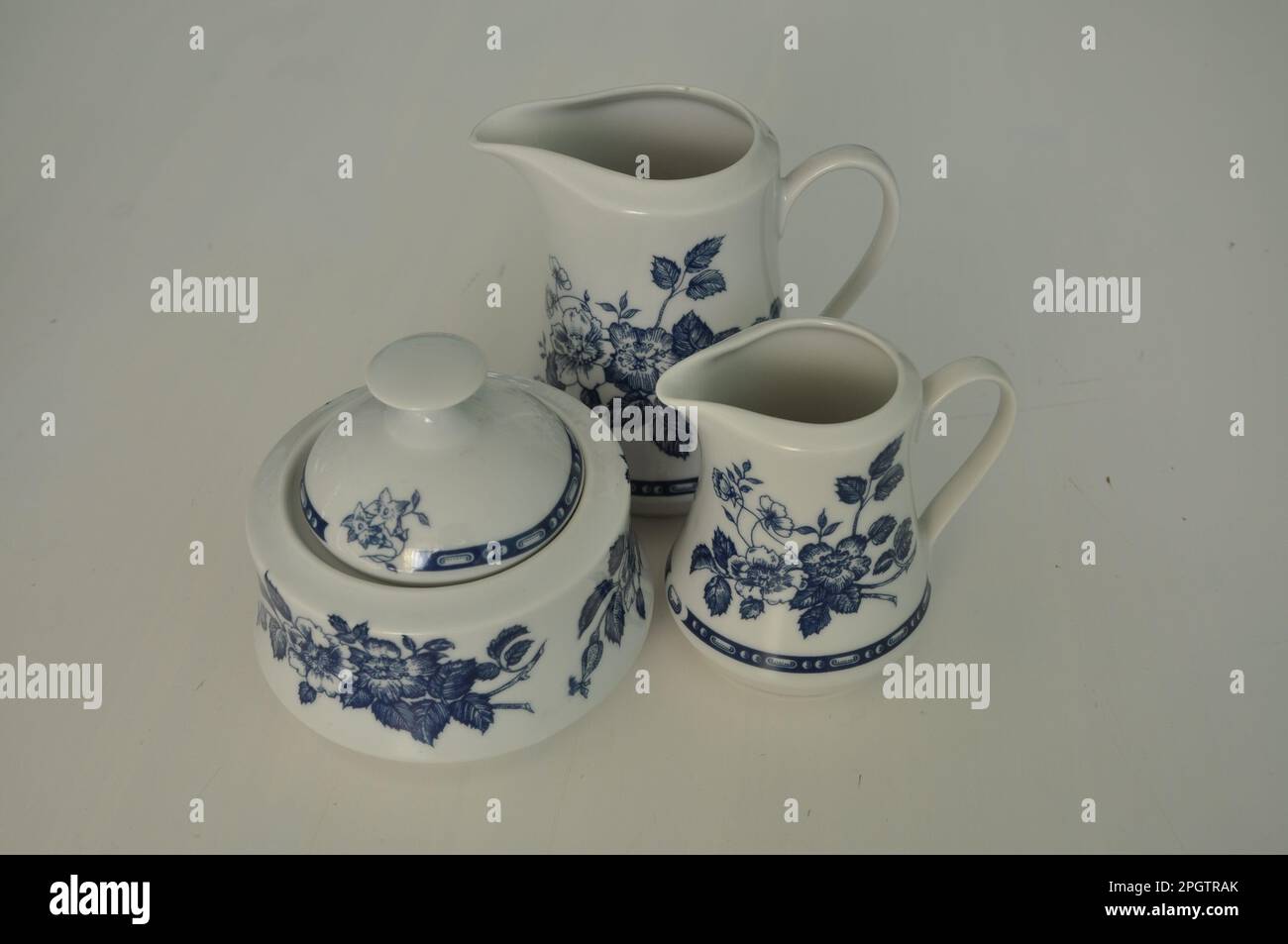 Complete set of milk and sugar service on a white background. Beautiful ...