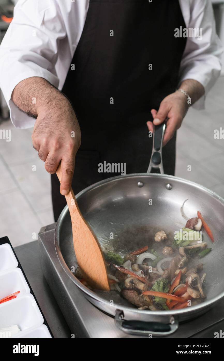 chef professional skills mixing technique Stock Photo - Alamy