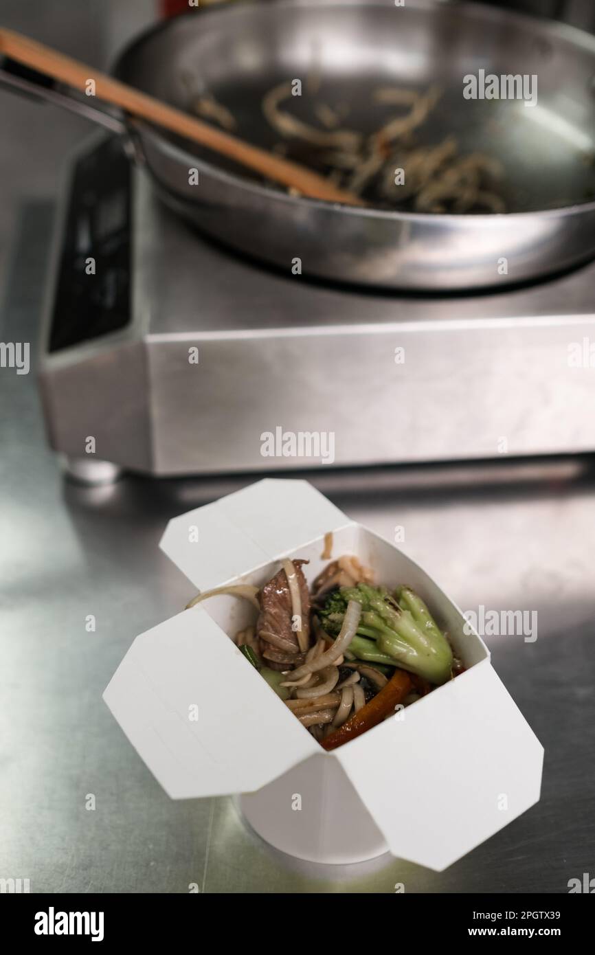 asian takeaway food box quick restaurant delivery Stock Photo - Alamy