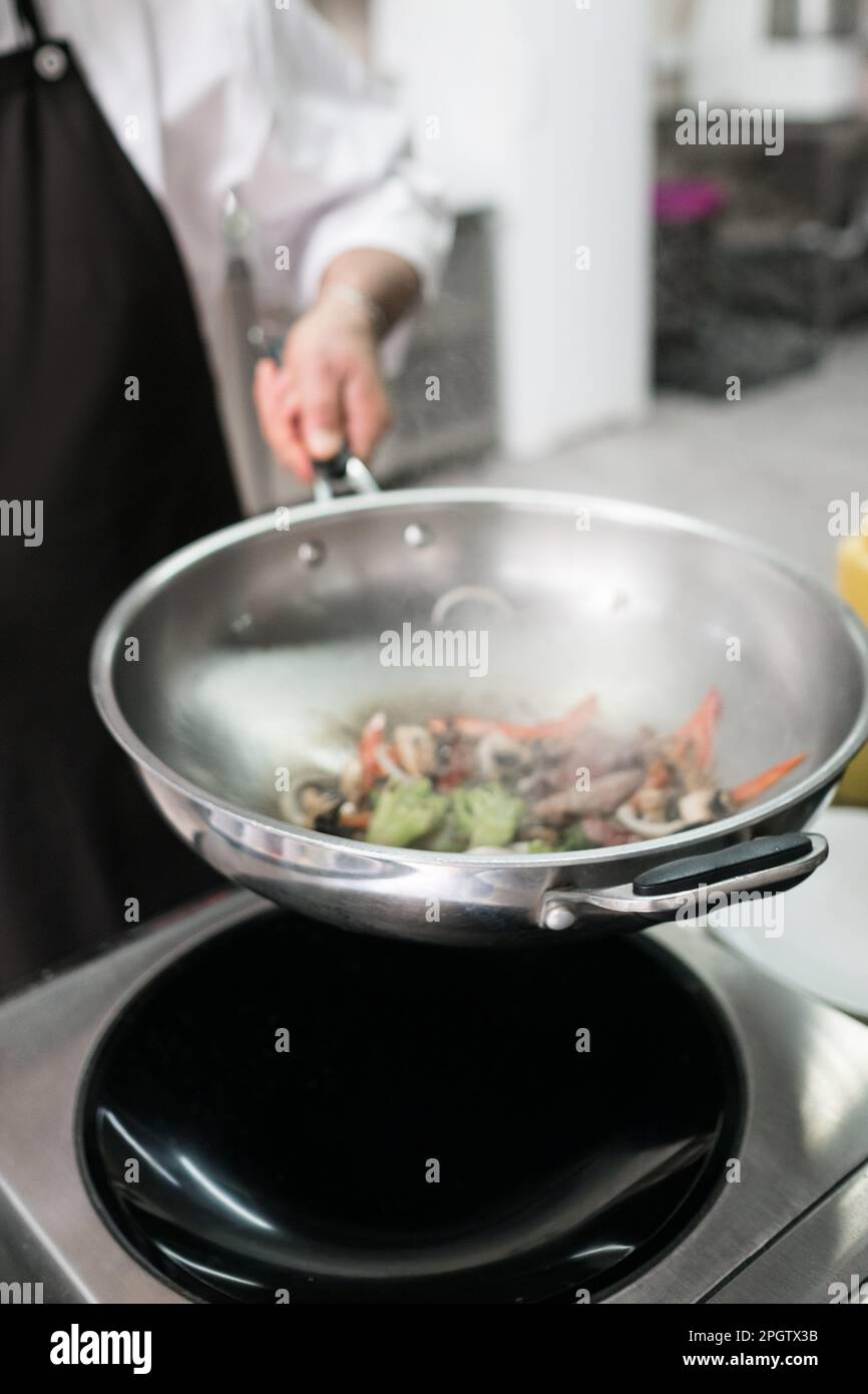 chef professional skills mixing technique Stock Photo - Alamy