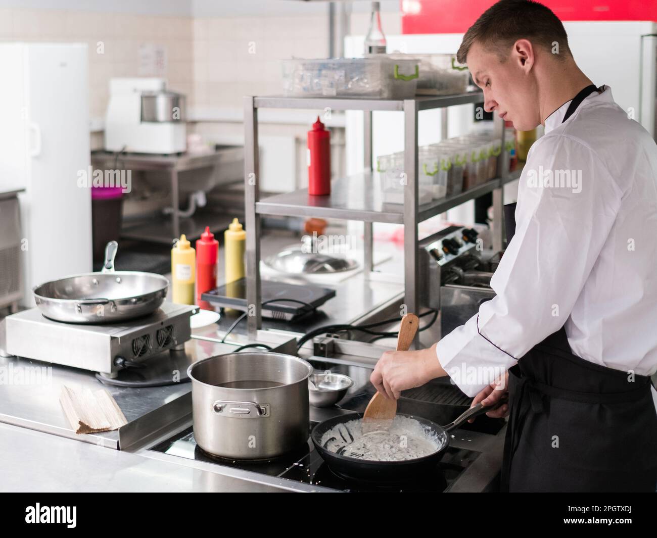 chef cooking restaurant kitchen professional work Stock Photo - Alamy