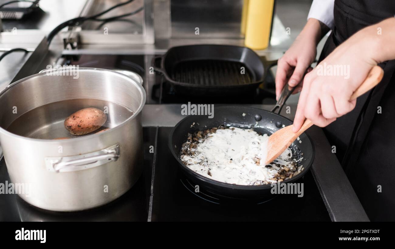 chef cooking restaurant kitchen professional work Stock Photo - Alamy