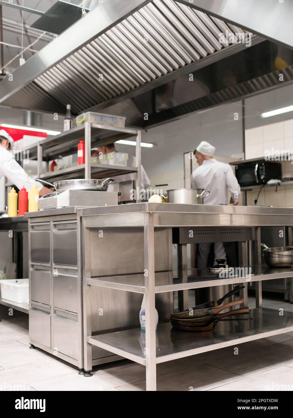 restaurant kitchen interior workspace clean tidy Stock Photo - Alamy